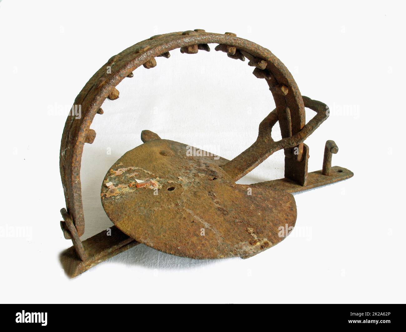 Studio shot of an old snap trap for wild animal hunting Stock Photo - Alamy