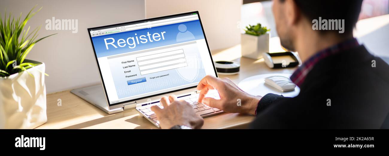 Businessman's Hand Filing Online Registration Form Stock Photo - Alamy