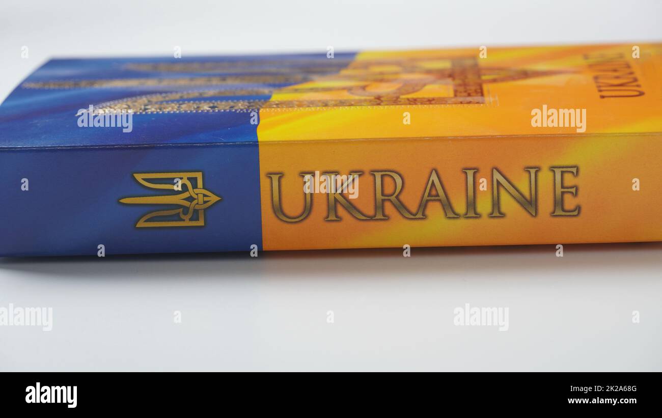 Ukraine flag and coat of arms. Golden trident on cloth flag. National ...