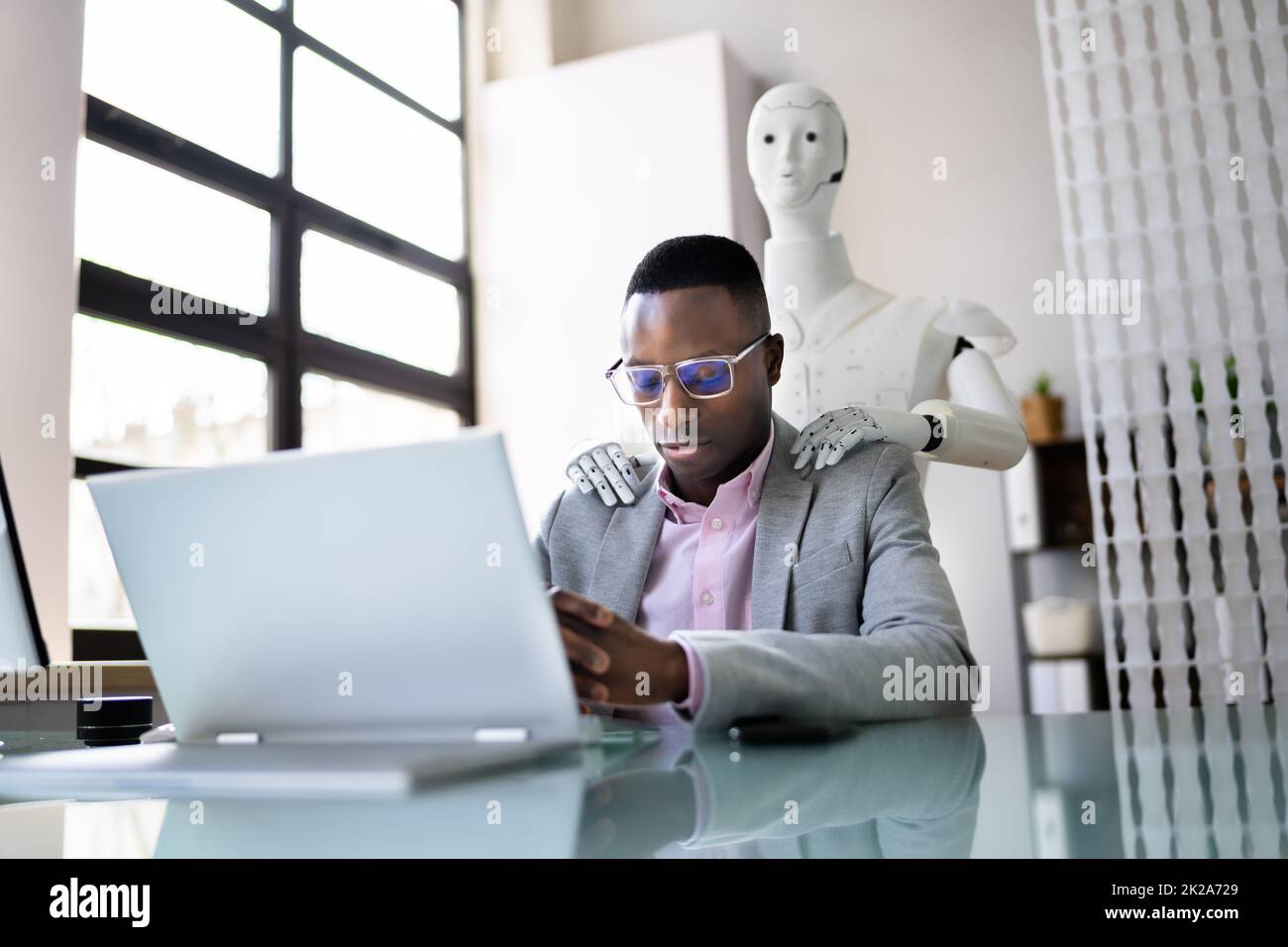 Physiotherapist AI Robot Doing Shoulders Massage Stock Photo - Alamy