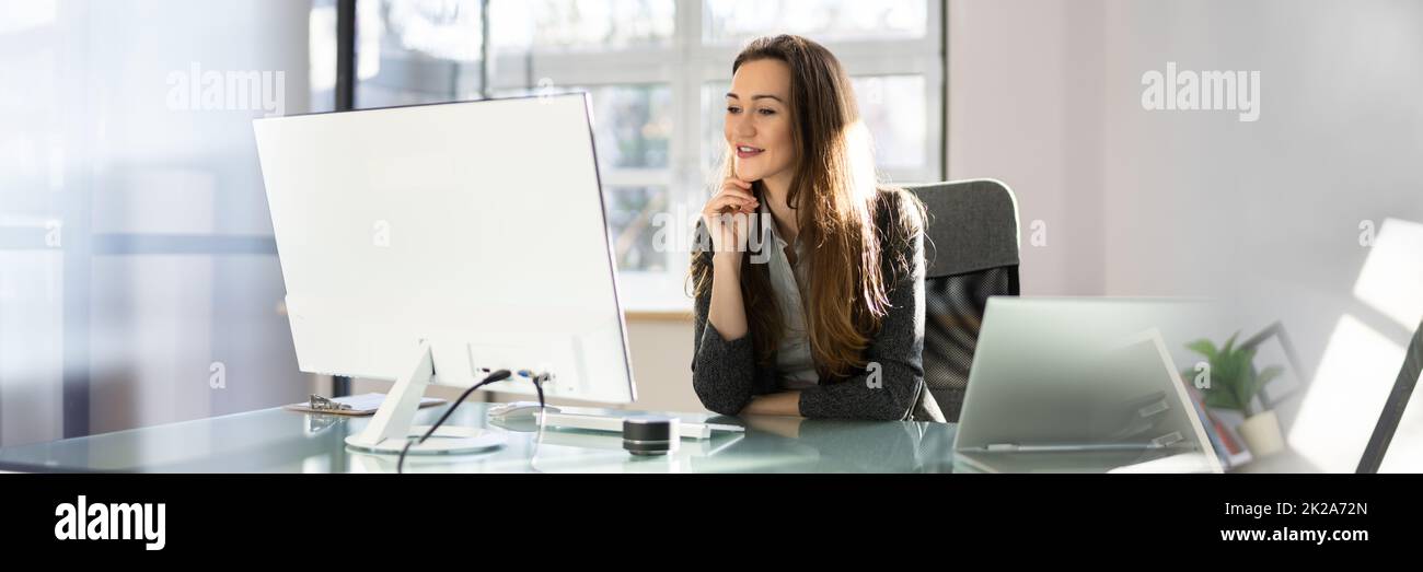 Happy Professional Woman Employee Using Computer Stock Photo - Alamy