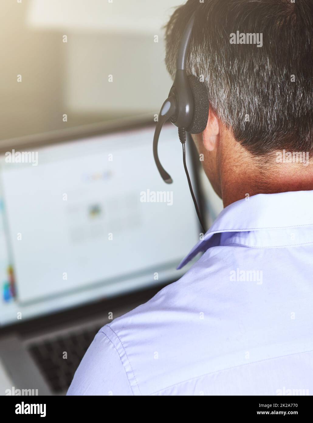 Working over laptop hi-res stock photography and images - Alamy