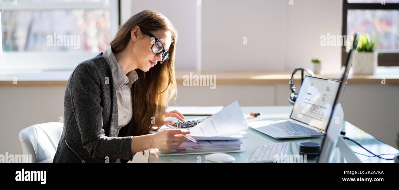Accountant Using Electronic Invoice Or Bill Stock Photo - Alamy
