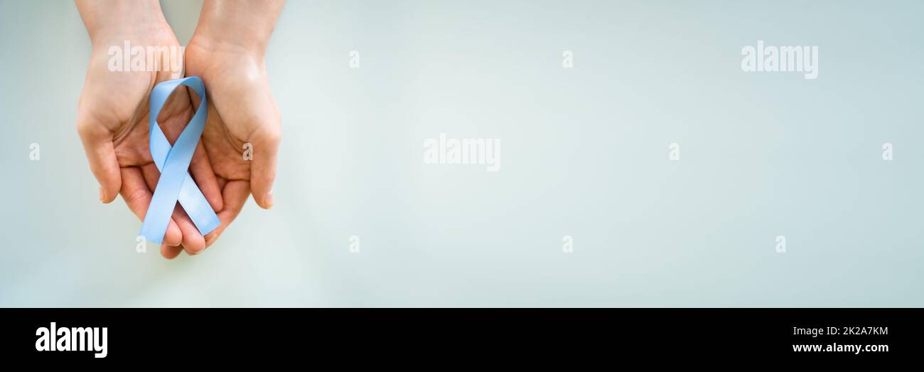 Teal Ribbon To Support Cervical Awareness Stock Photo - Alamy