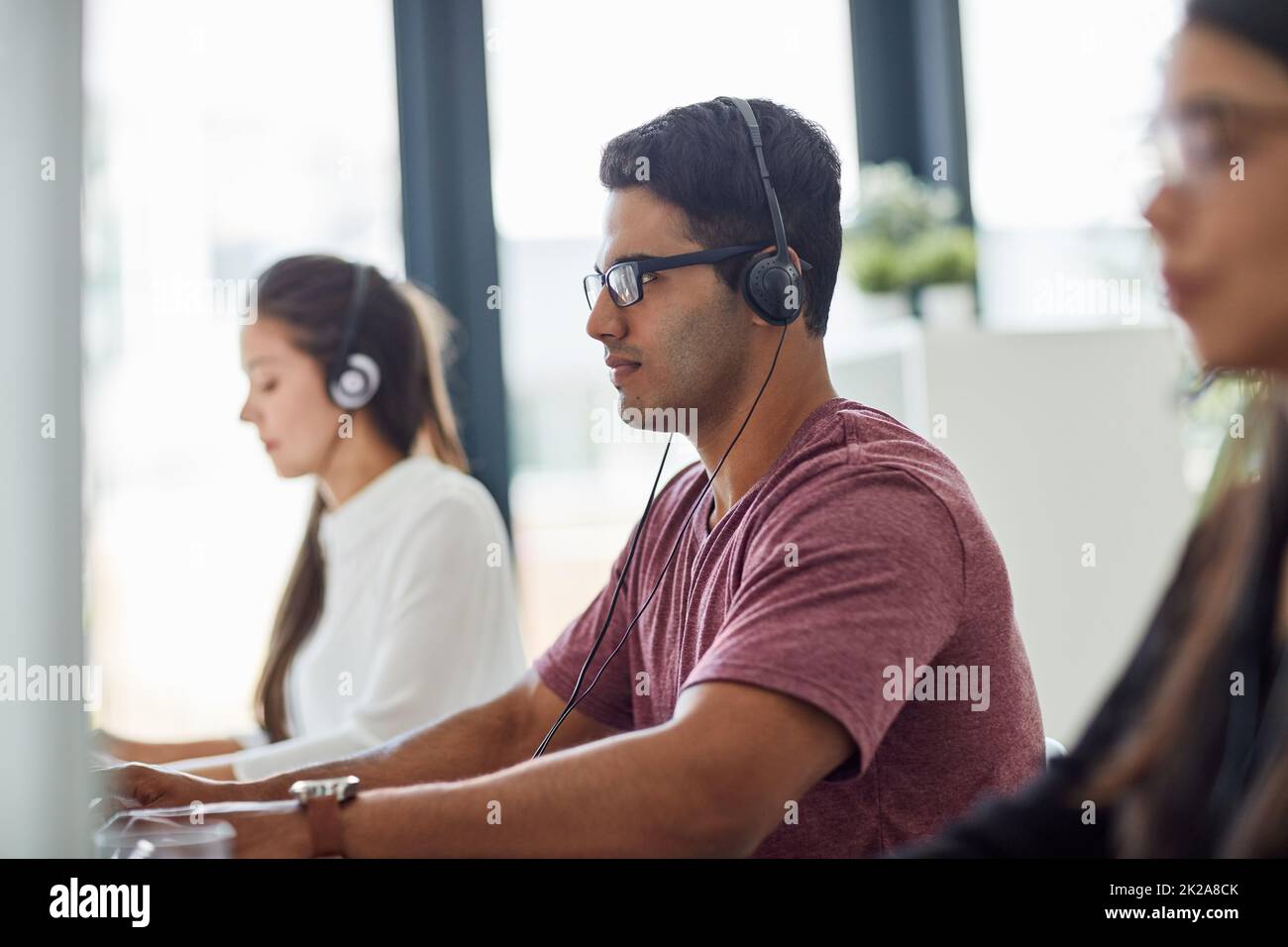 They are on the front line of customer service. Shot of a group of customer service ...