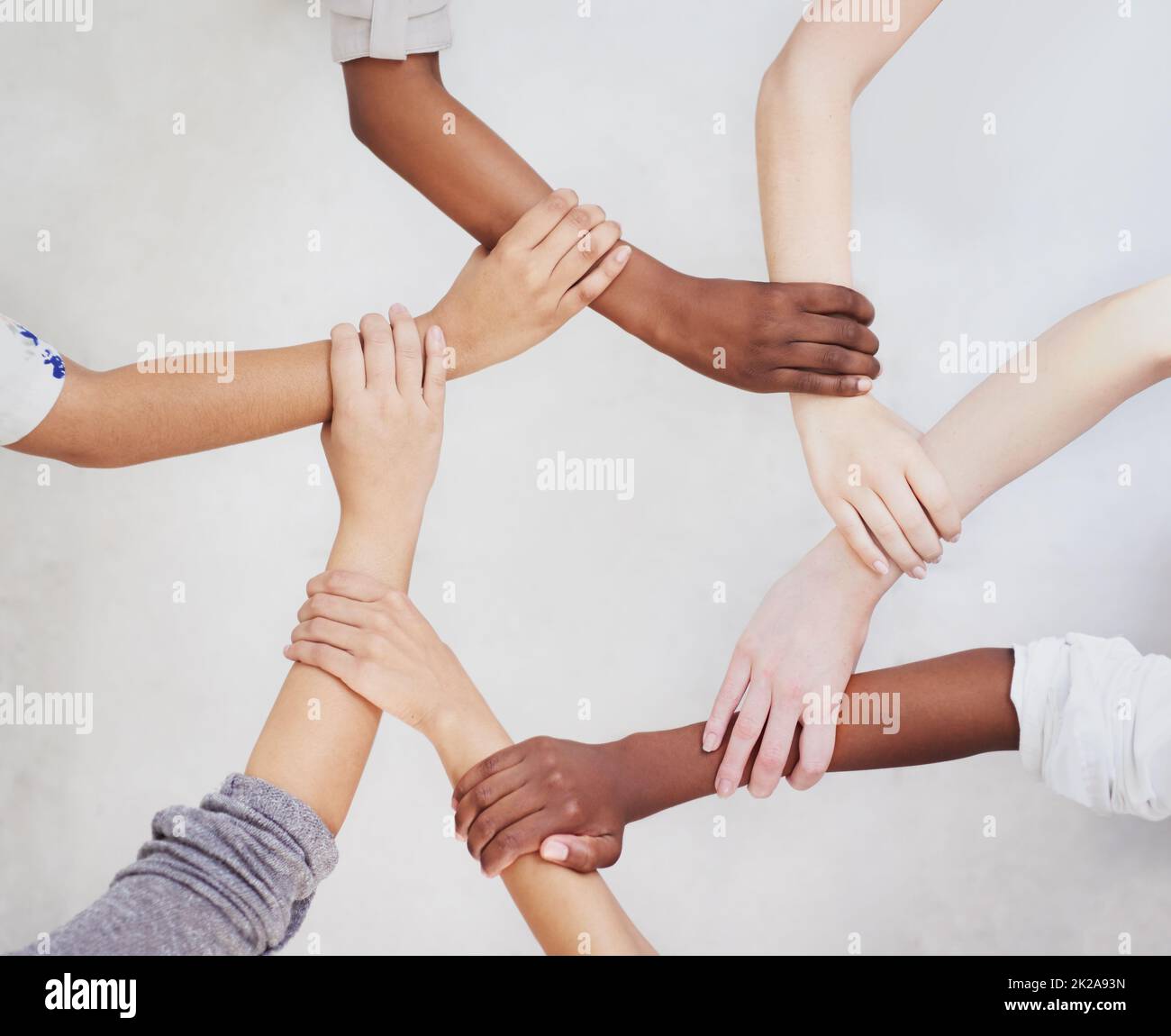 Adults holding hands group hi-res stock photography and images - Alamy
