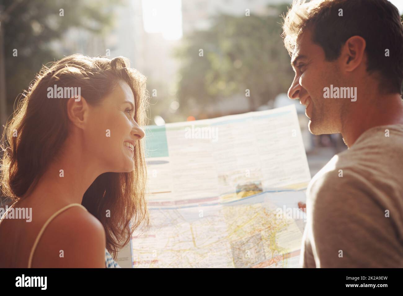 Young lost woman holding city map hi-res stock photography and images ...