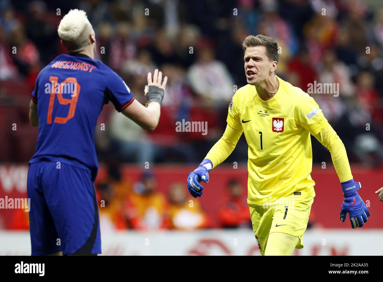 WARSAW - (lr) Poland goalkeeper Wojciech Szczesny, Wout Weghorst of ...