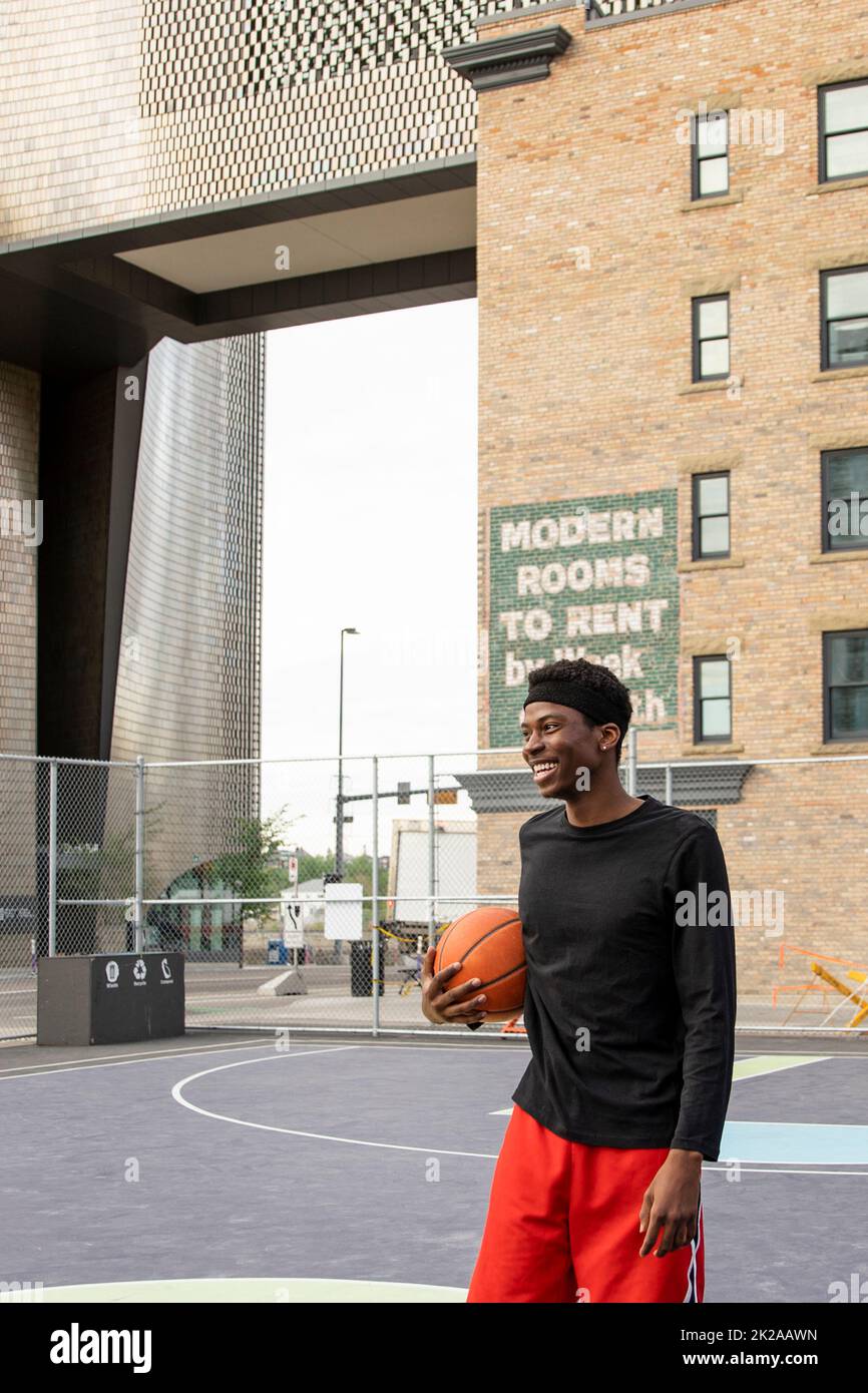 Basketball man standing hi-res stock photography and images - Alamy