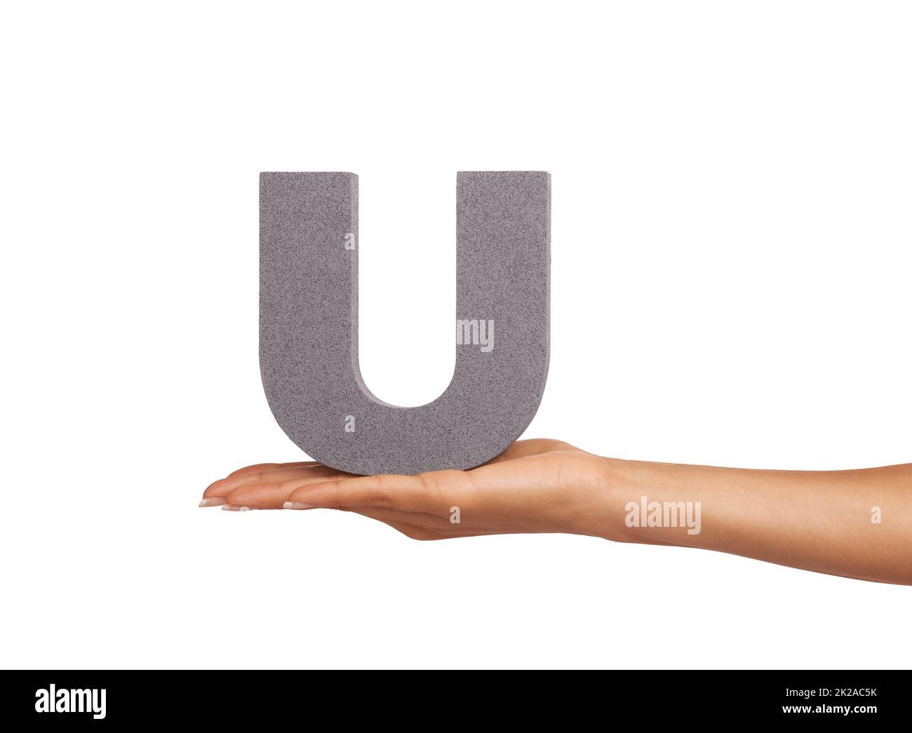 U should brush up on your letters - Education. A young woman holding a ...