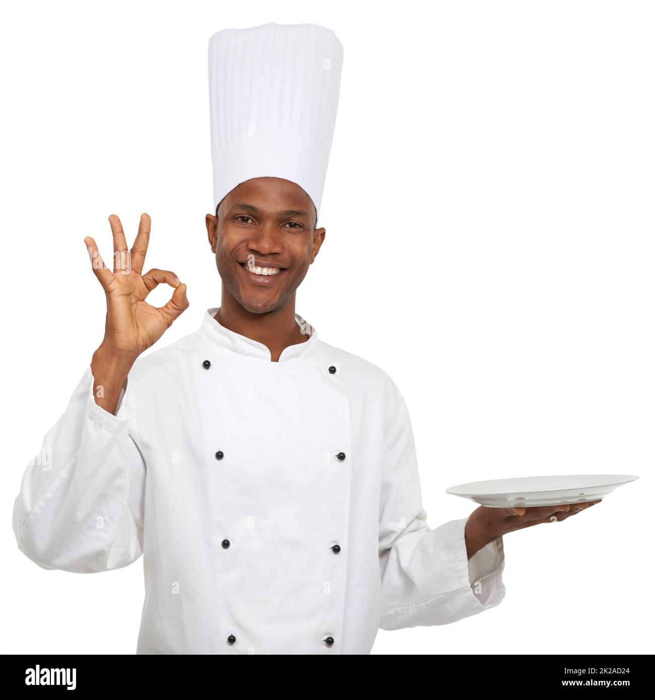 His dishes are always perfect. Portrait of an african chef signaling ... His dishes are always perfect. Portrait of an african chef signaling ...