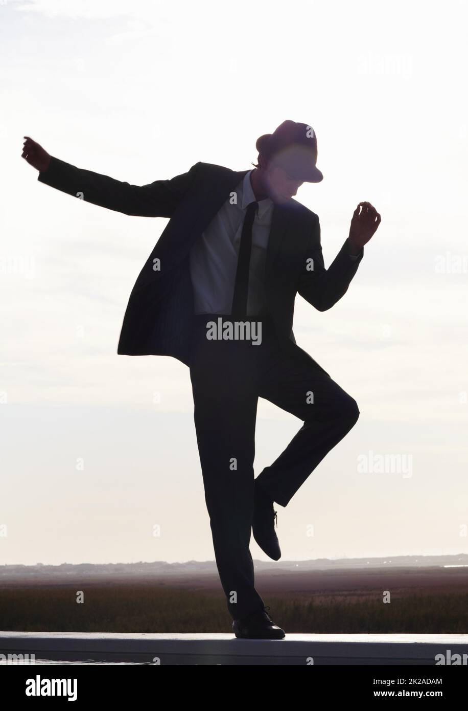 Man dancing alone in suit hi-res stock photography and images - Alamy