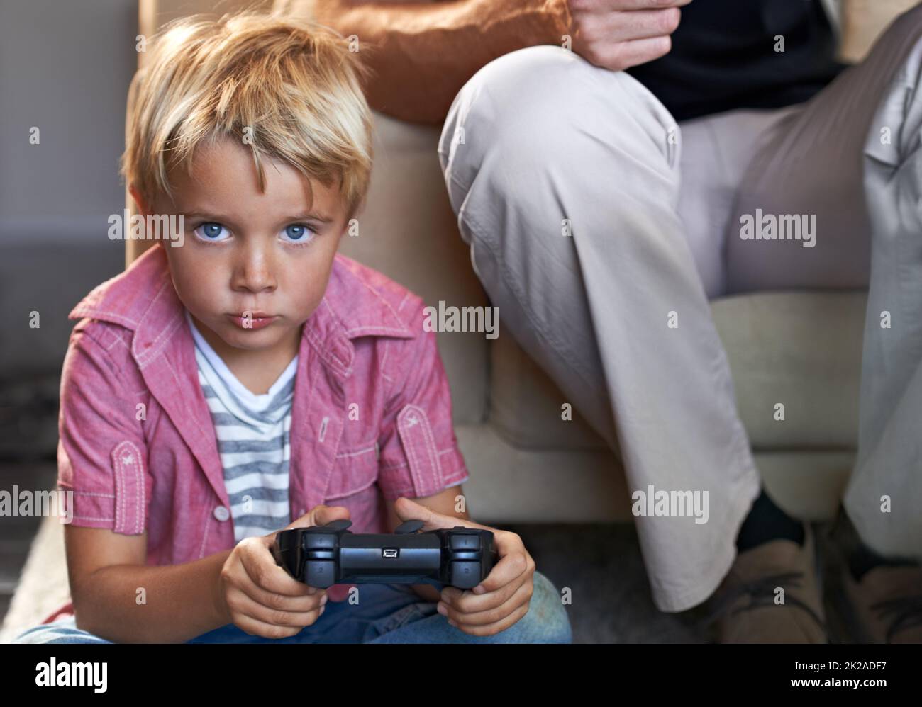 Two boys playing a video game hi-res stock photography and images - Alamy