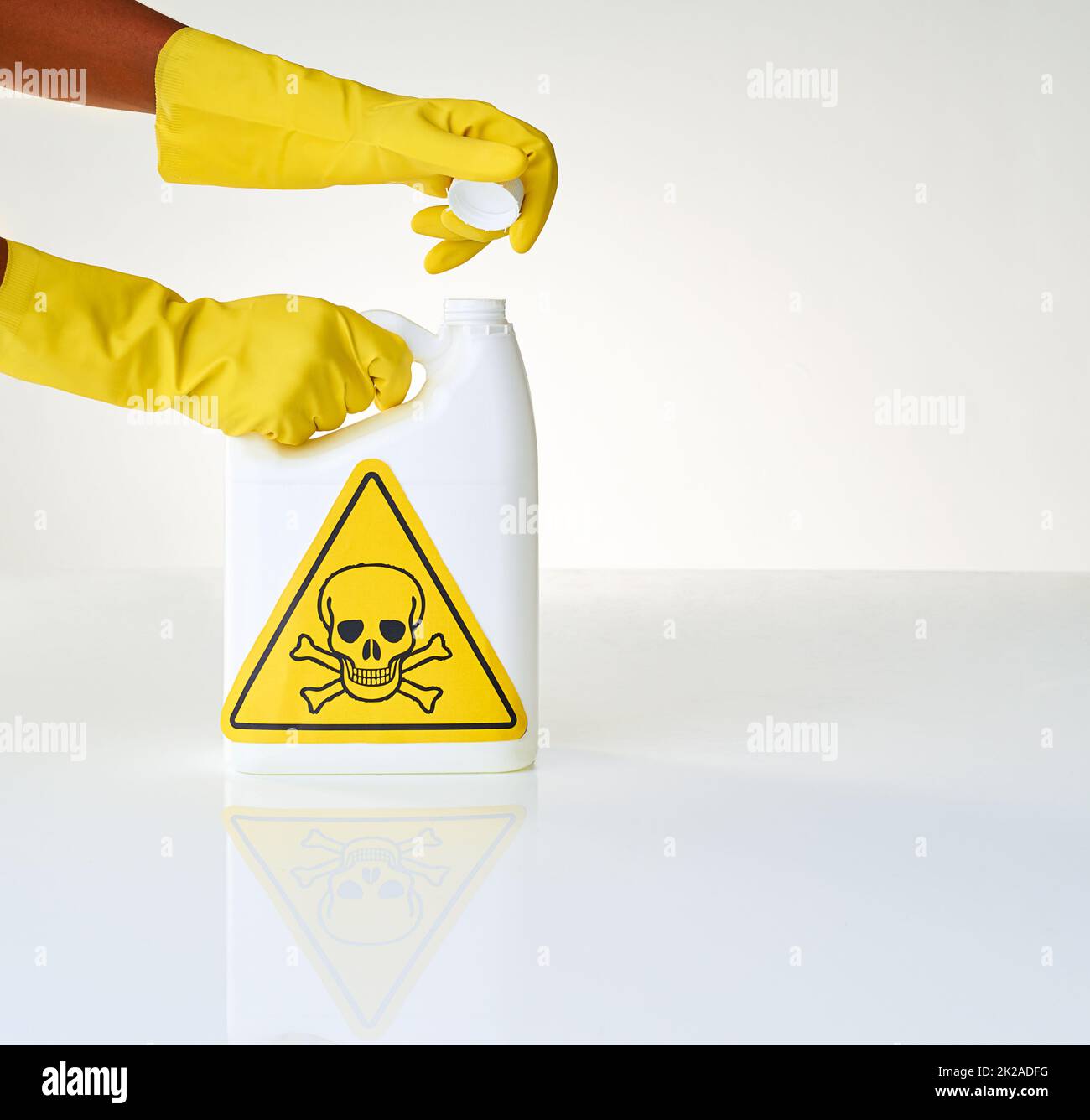 Caution - handle with care. Cropped shot of a person opening a bottle ...