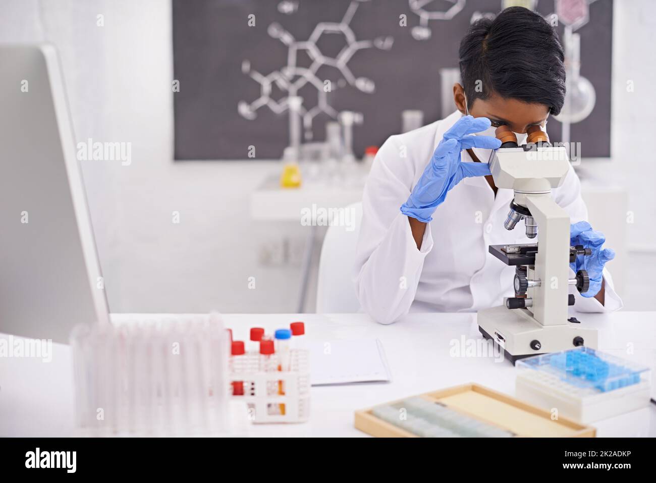 Indian with microscope hi-res stock photography and images - Alamy