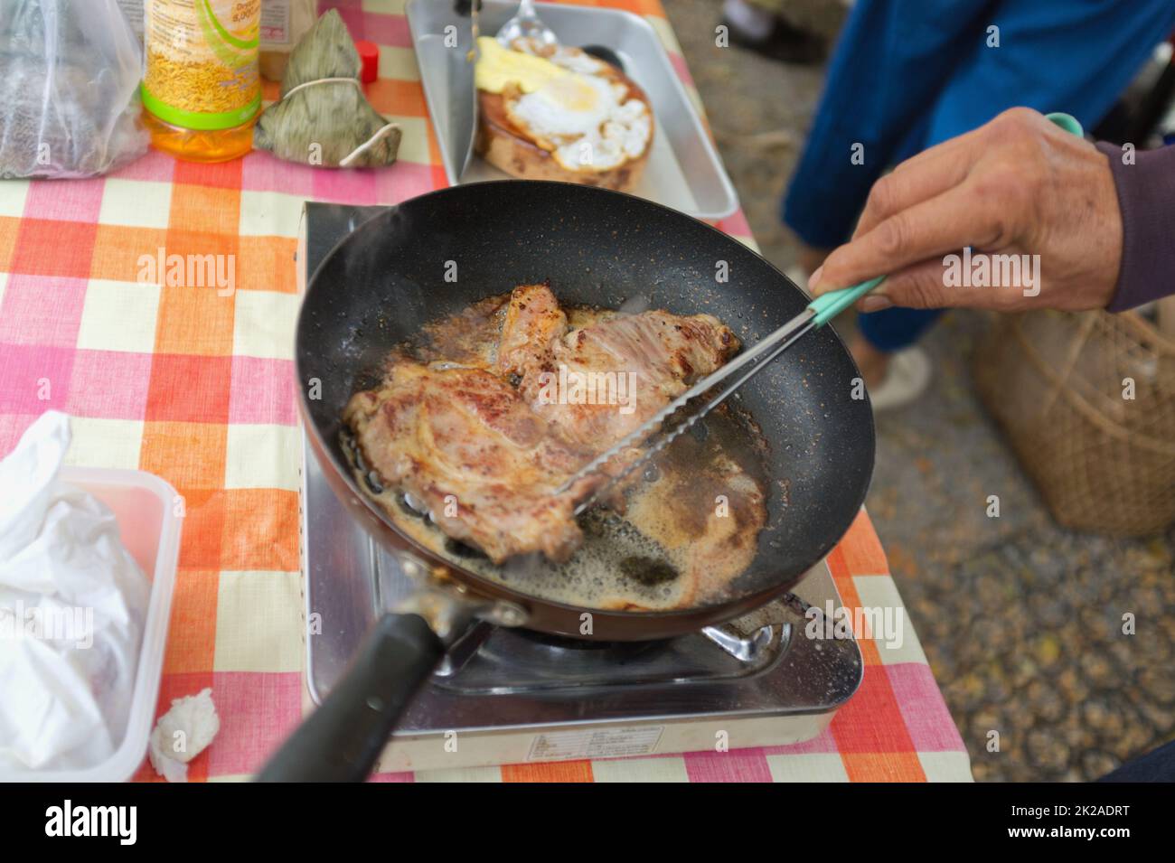 Fried pork in pan . THAI FOOD Stock Photo - Alamy