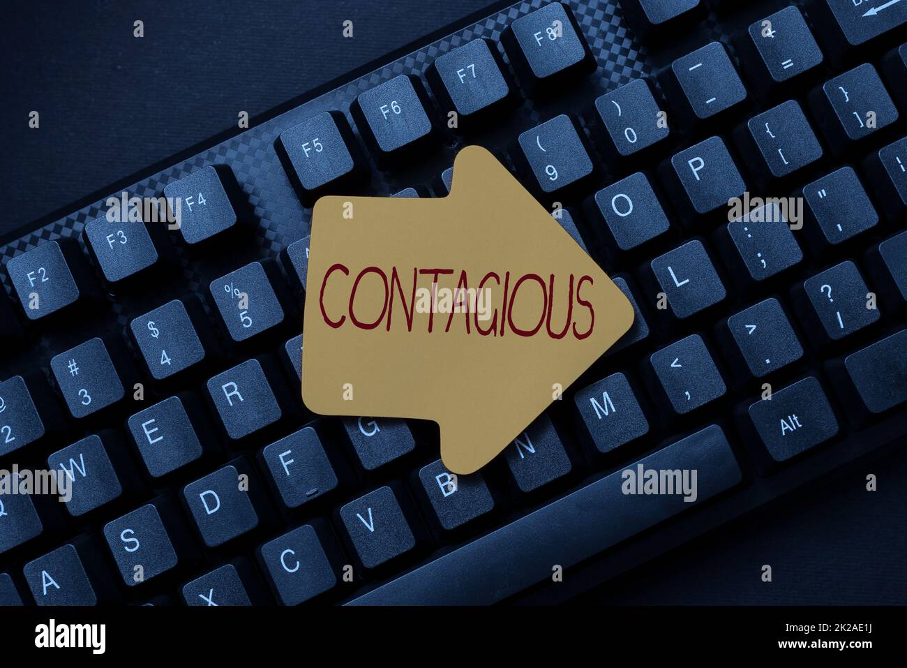 Sign displaying Contagious. Word Written on transmissible by direct or ...