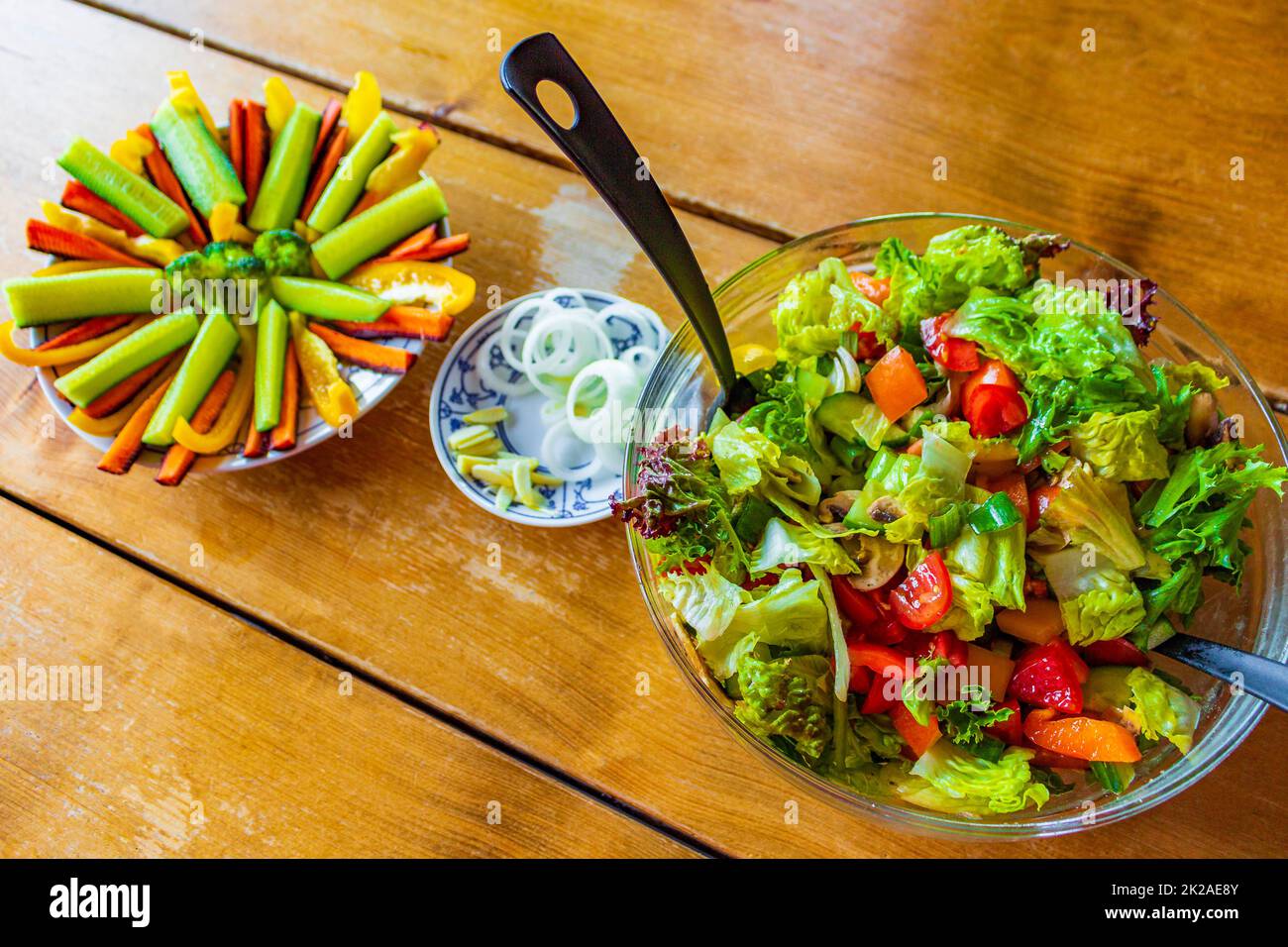 Colorful vegetables greens food cut and served in a bowl Stock Photo ...