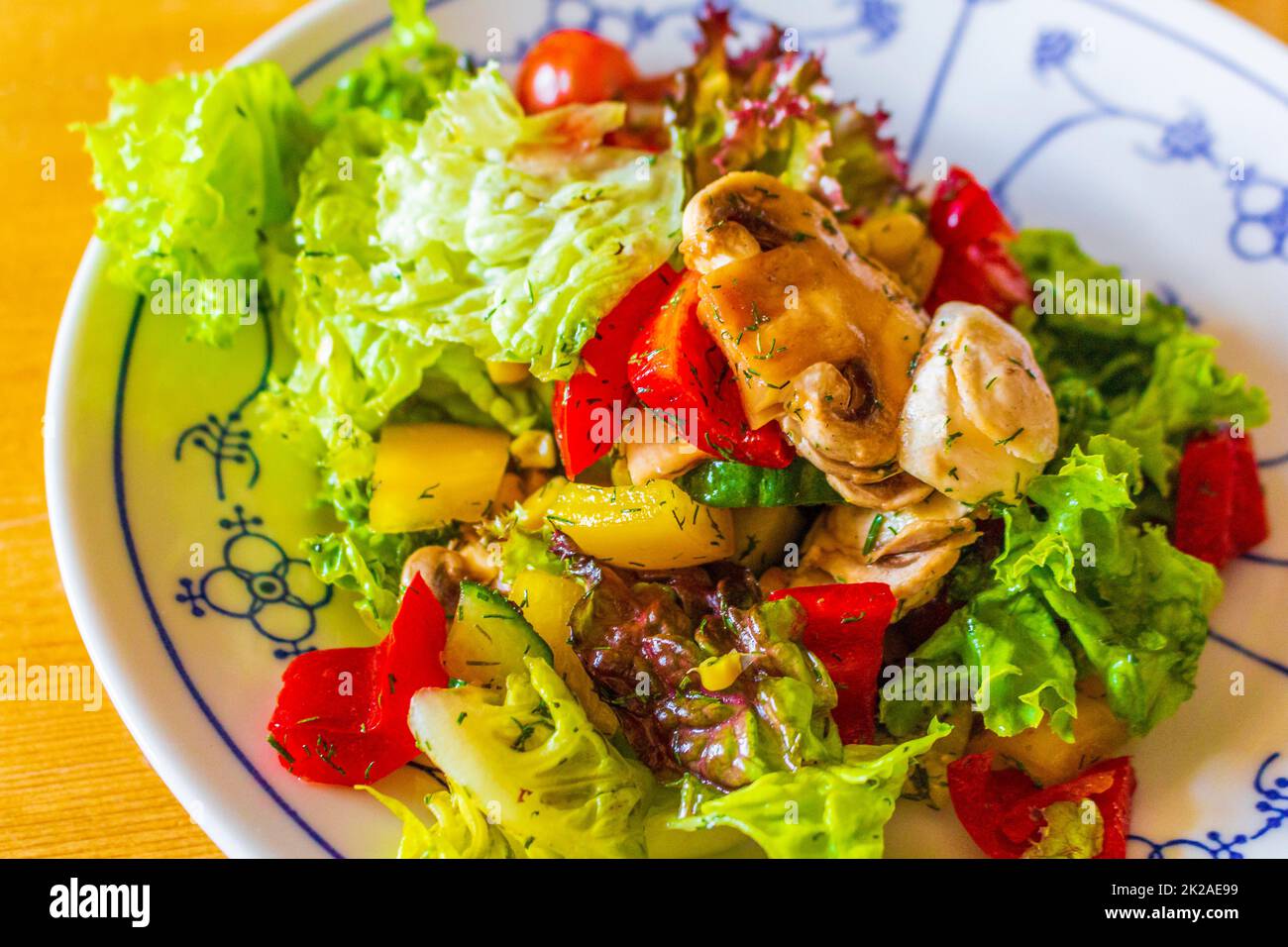 Colorful vegetables greens food cut and served on a plate Stock Photo ...