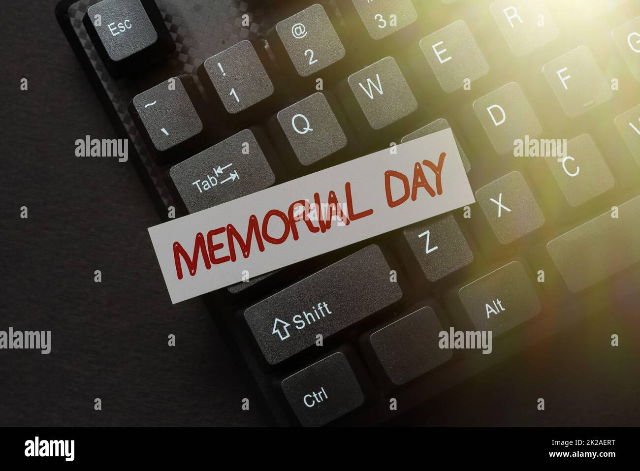 Hand writing sign Memorial Day. Word for day to remember and honor the ...