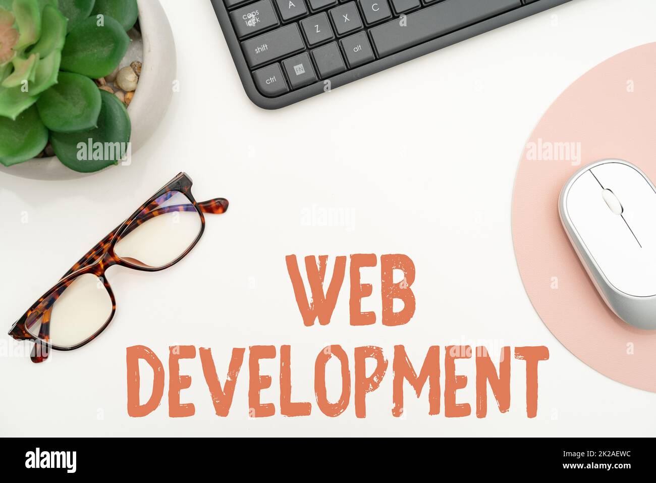 Hand writing sign Web Development. Business overview Web Development Office Supplies Over Desk ...