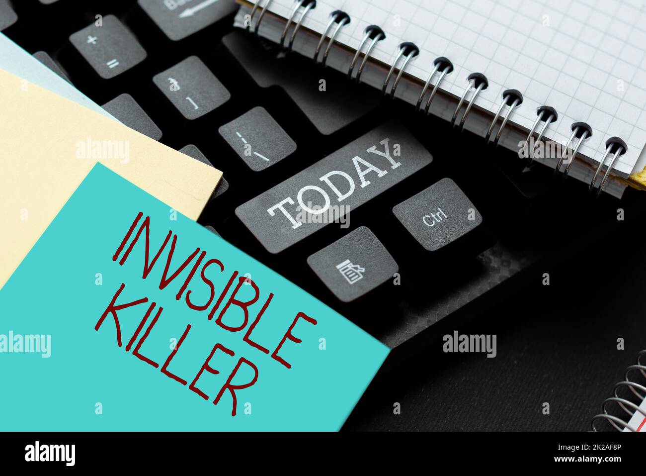 Sign displaying Invisible Killer. Word Written on presence into the air ...