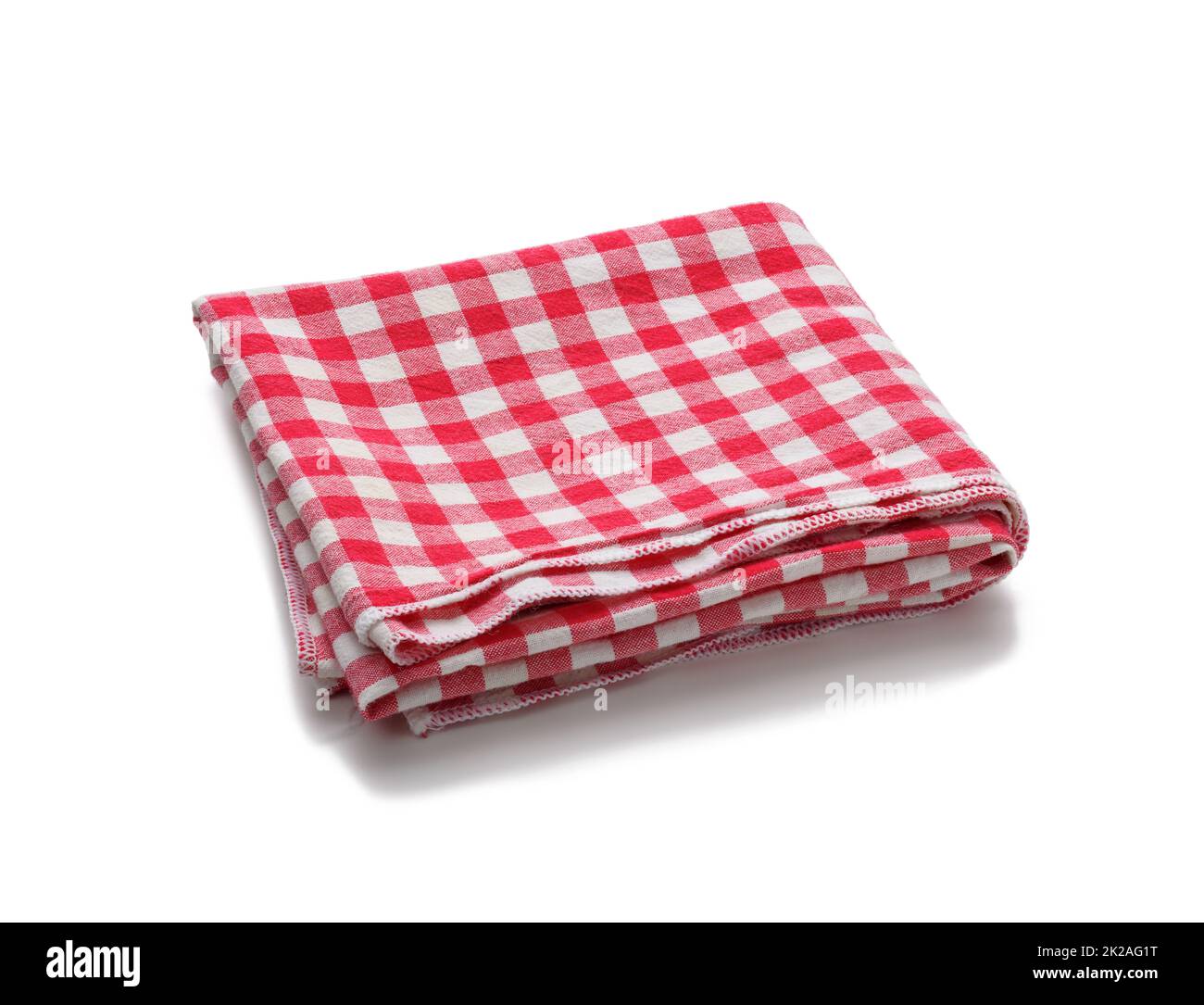 folded cotton red white checkered napkin on a white background Stock ...