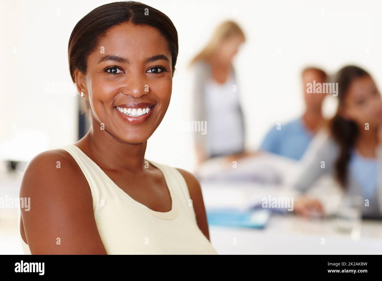 Shes excited to be part of the team. Closeup of a smiling young African ...