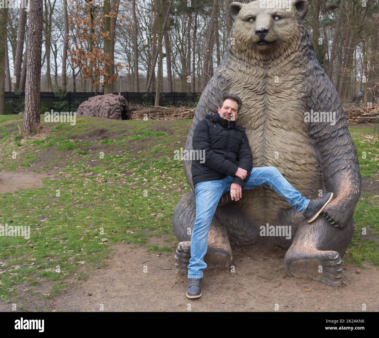 Thoughtful man with bear Stock Photo - Alamy