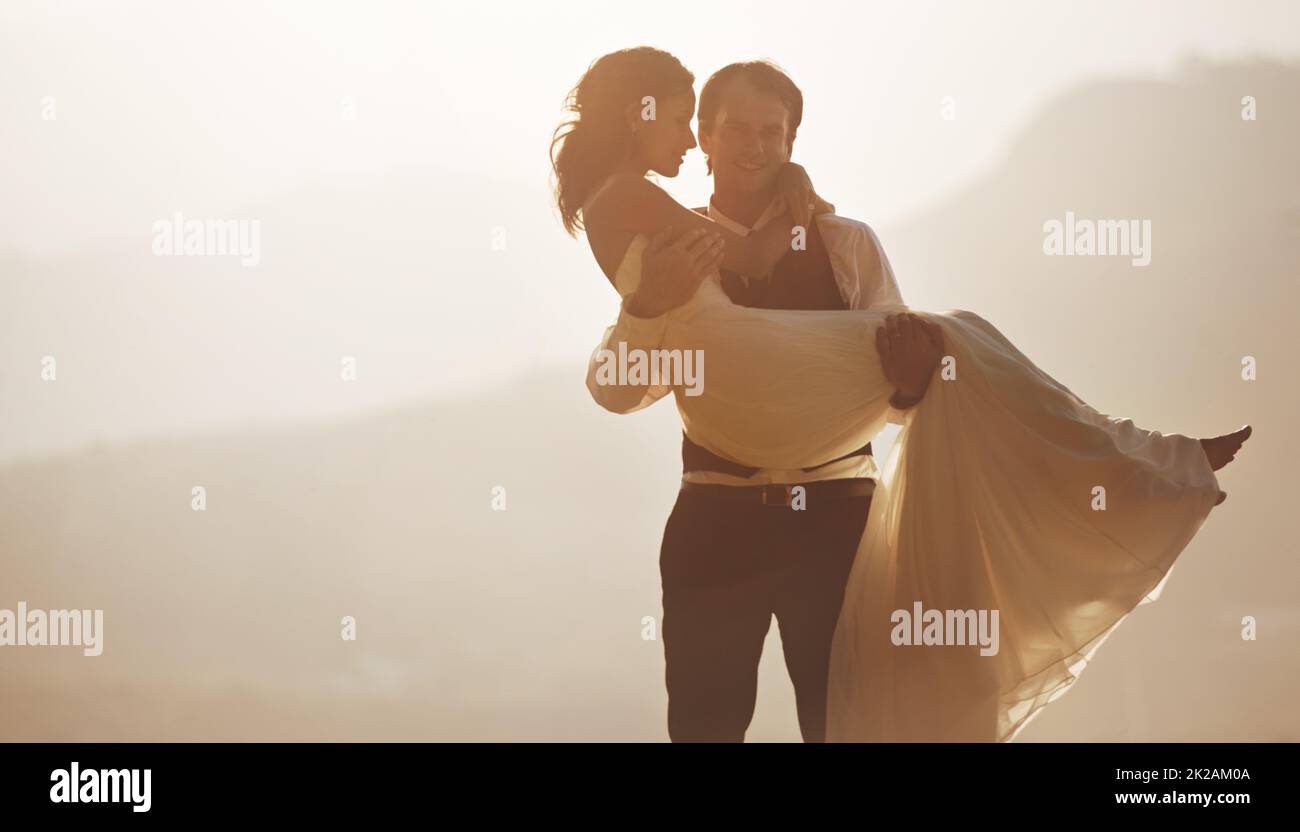 Carrying bride hi-res stock photography and images - Alamy
