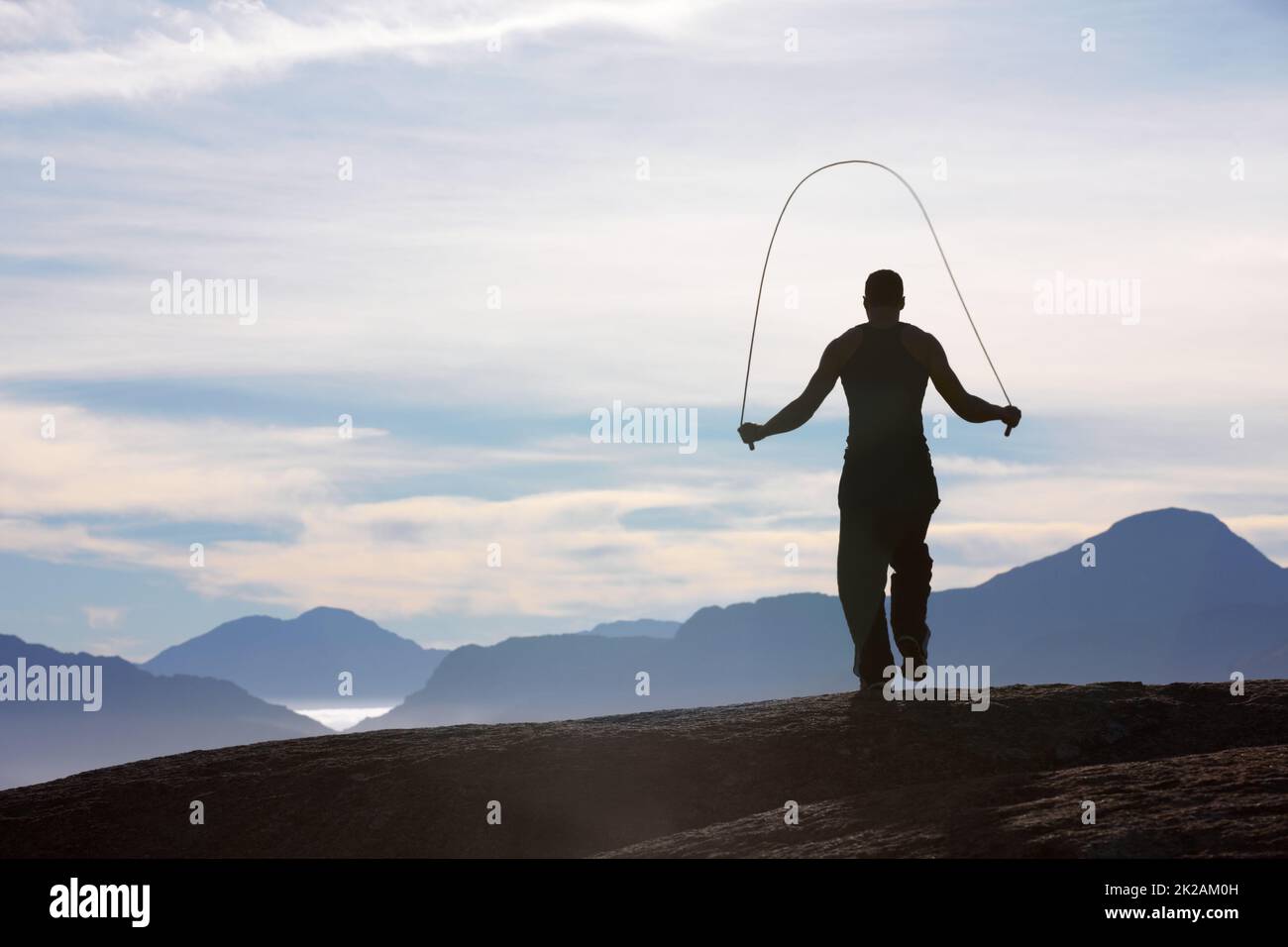Man skipping behind hi-res stock photography and images - Alamy
