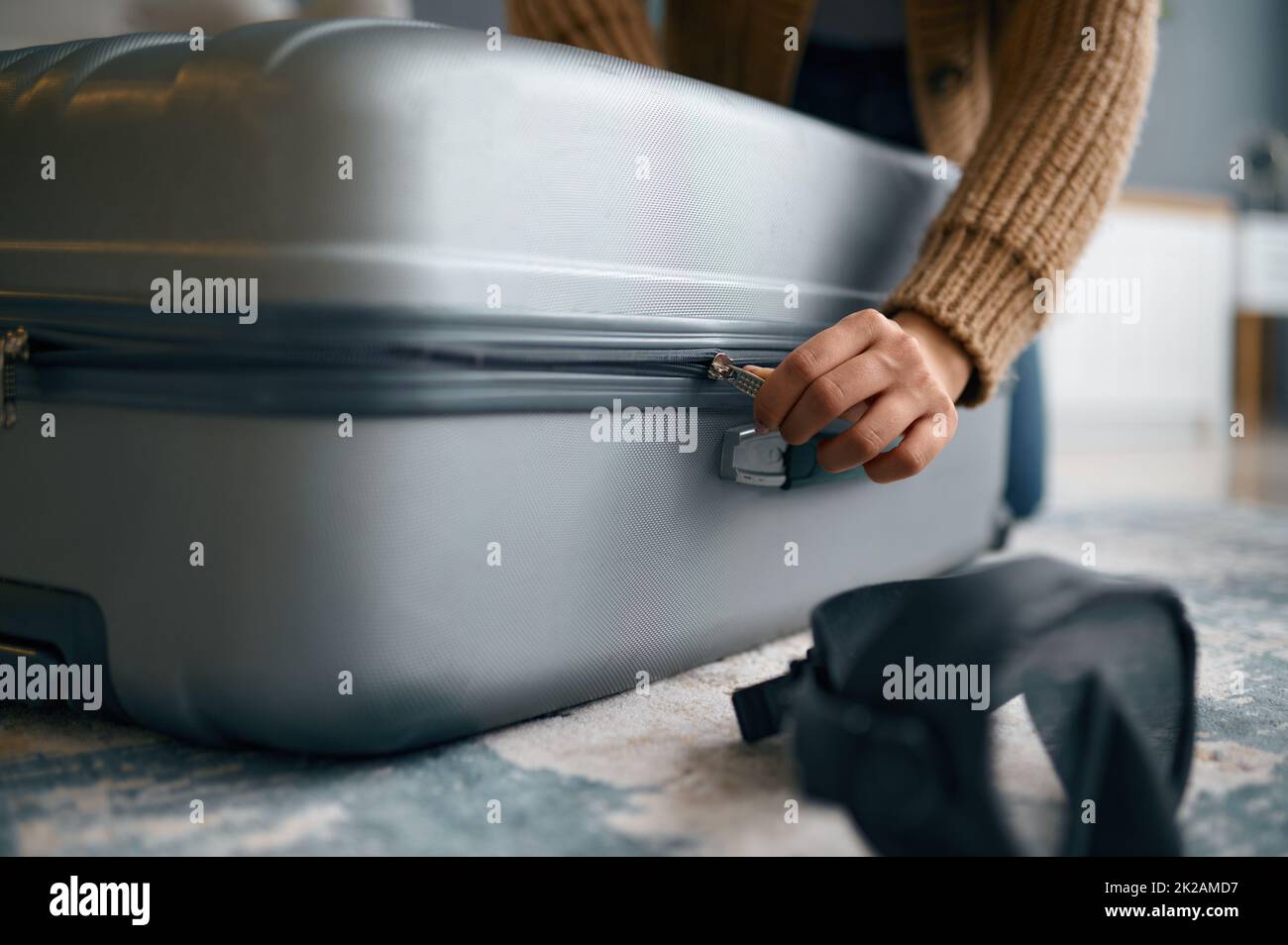 Closeup hand luggage hi-res stock photography and images - Alamy