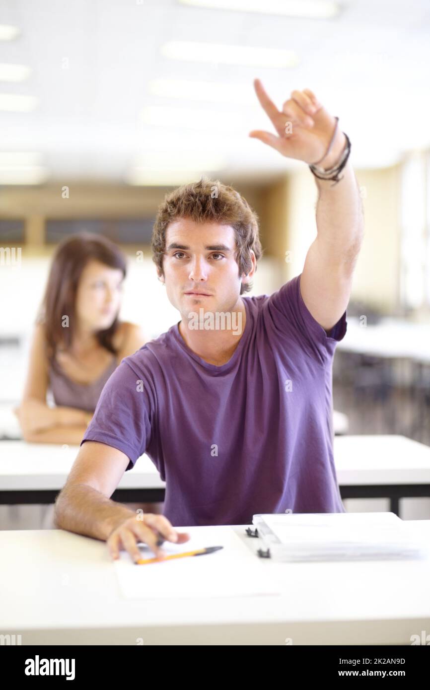 Female university student raising hand hi-res stock photography and ...