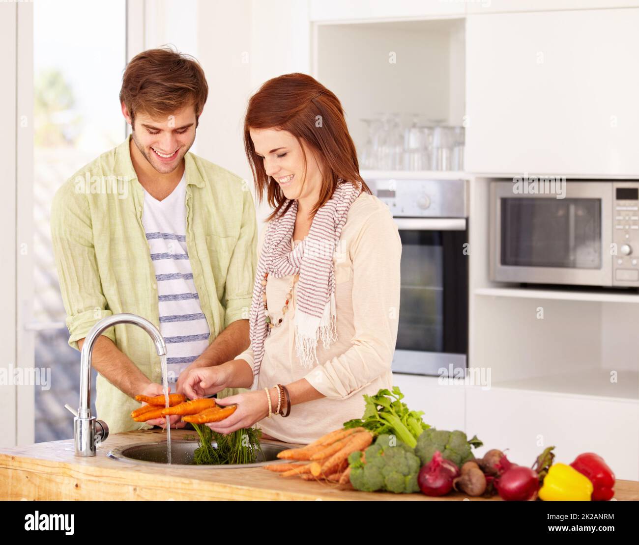 Married couple cleaning house hi-res stock photography and images - Alamy
