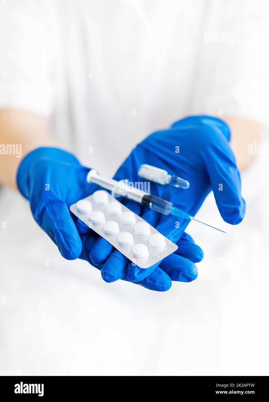 Young doctor holds injection coronavirus hi-res stock photography and ...