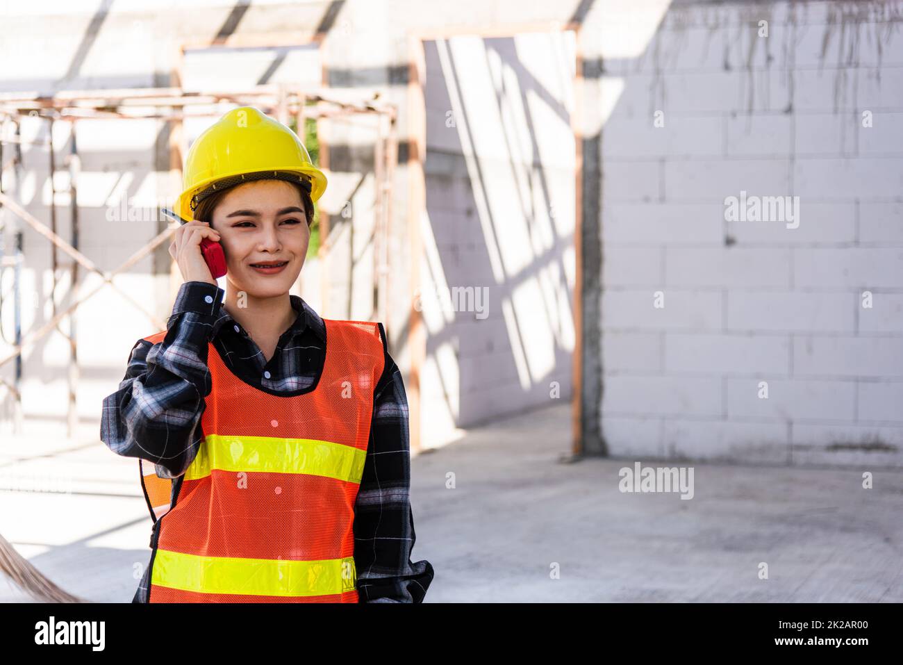 Asian engineer foreman architect worker woman working at building ... Asian engineer foreman architect worker woman working at building ...