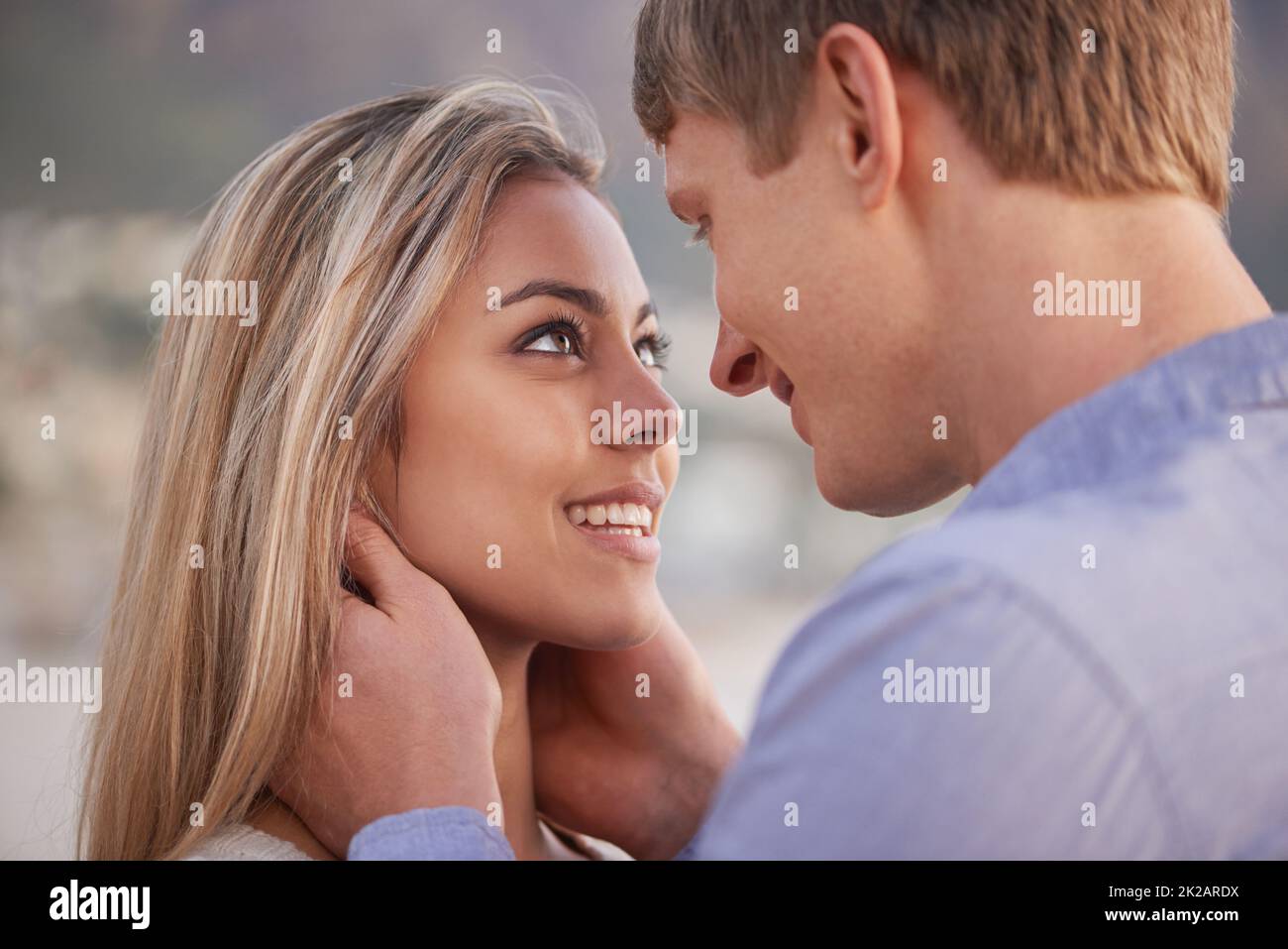 I love getting lost in your eyes. a happy young couple enjoying a ...