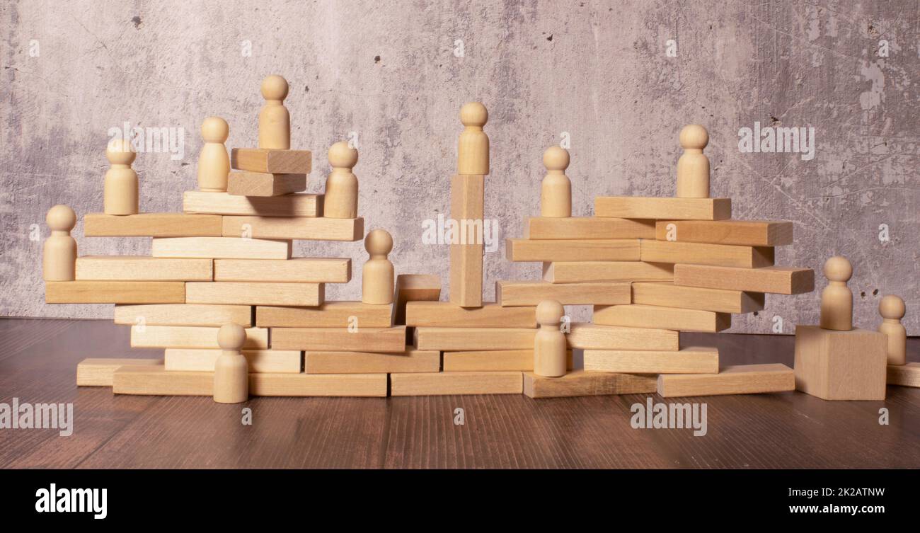 Wooden figurines in the shape of people silhouette, communication ...