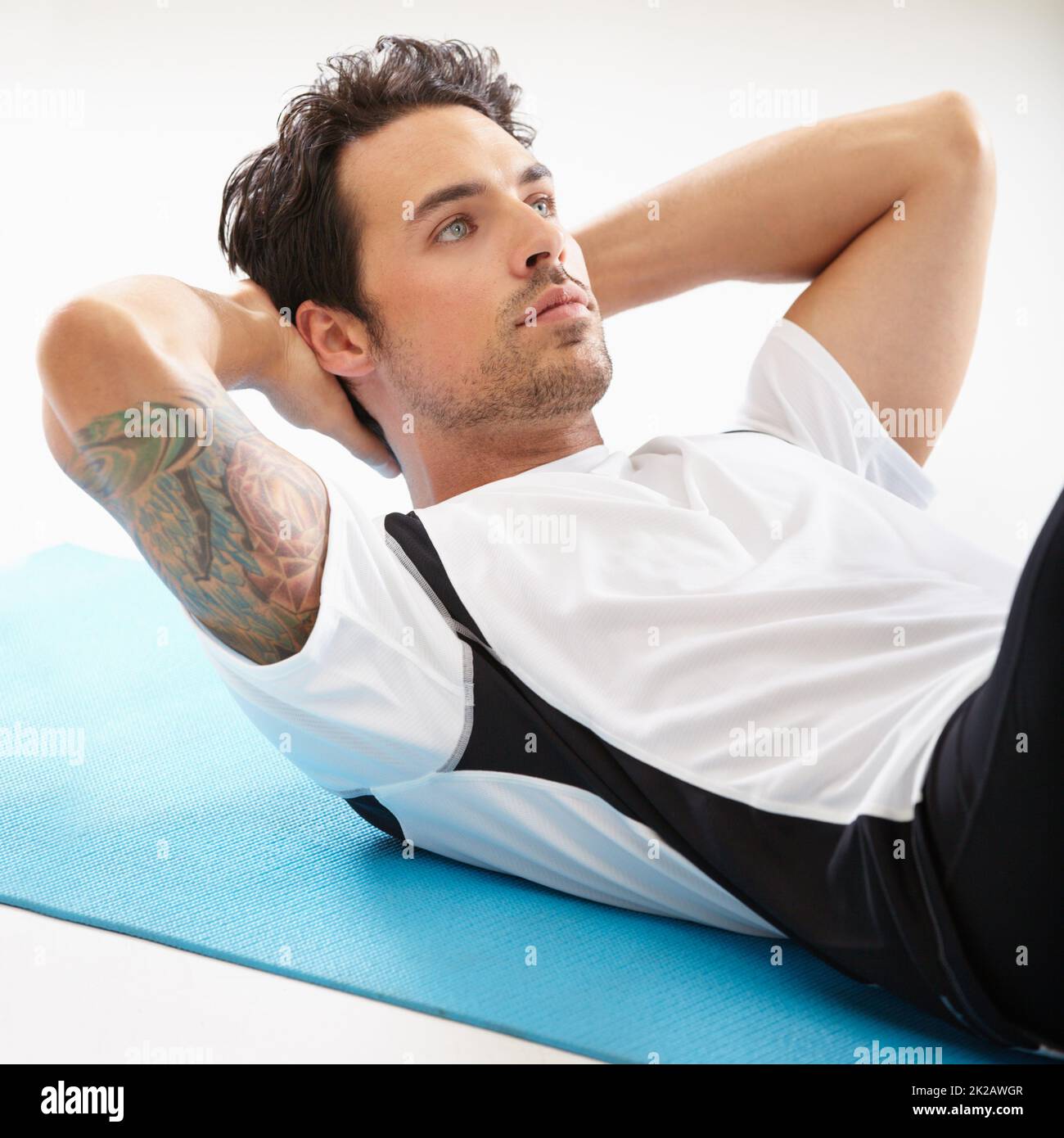 Man doing sit ups hi-res stock photography and images - Alamy