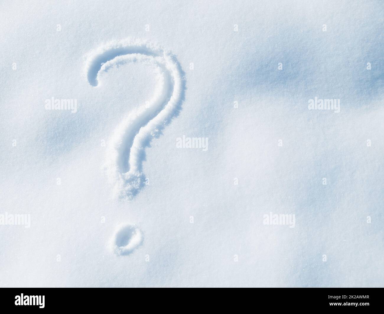 Winter thoughts. A question mark drawn in the snow Stock Photo - Alamy