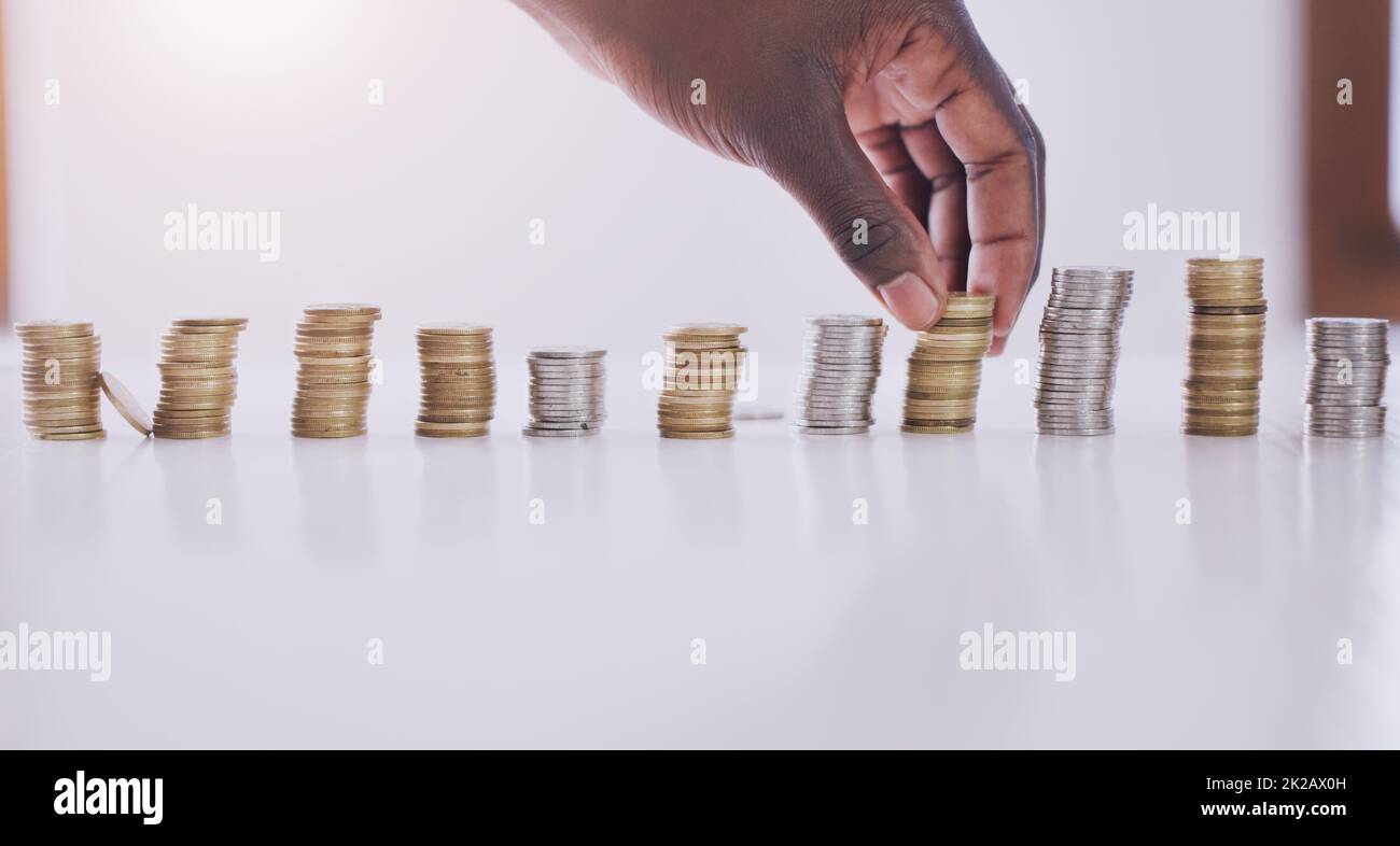 Stacking coins african hi-res stock photography and images - Alamy