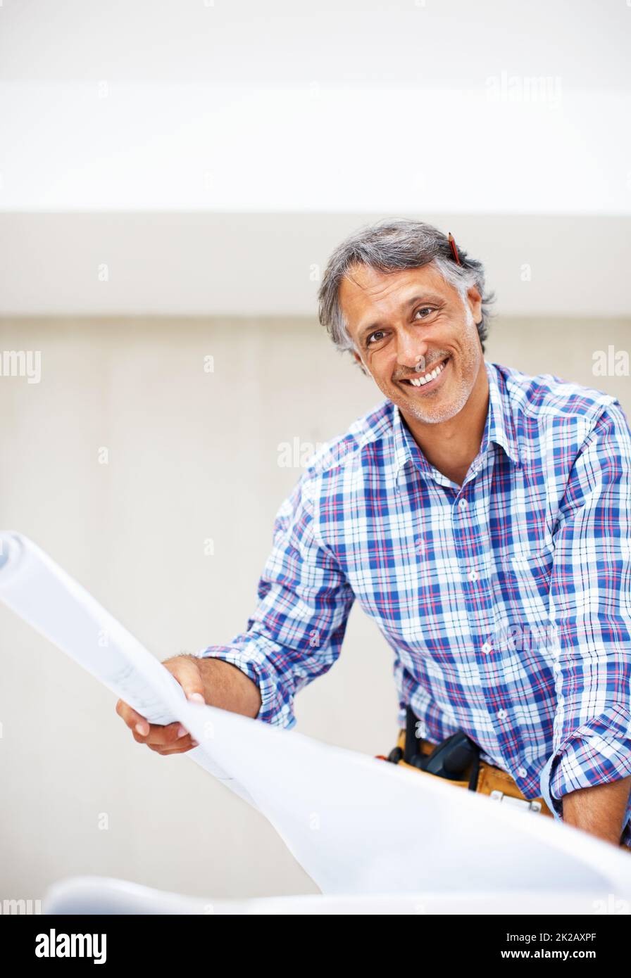 Happy engineer smiling. Portrait of handsome mature architect smiling ... Happy engineer smiling. Portrait of handsome mature architect smiling ...