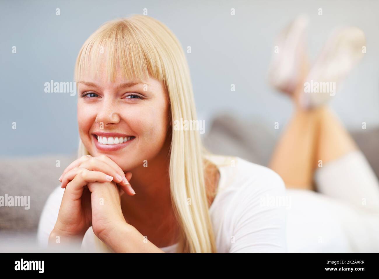 Relaxed young adult sofa hi-res stock photography and images - Alamy