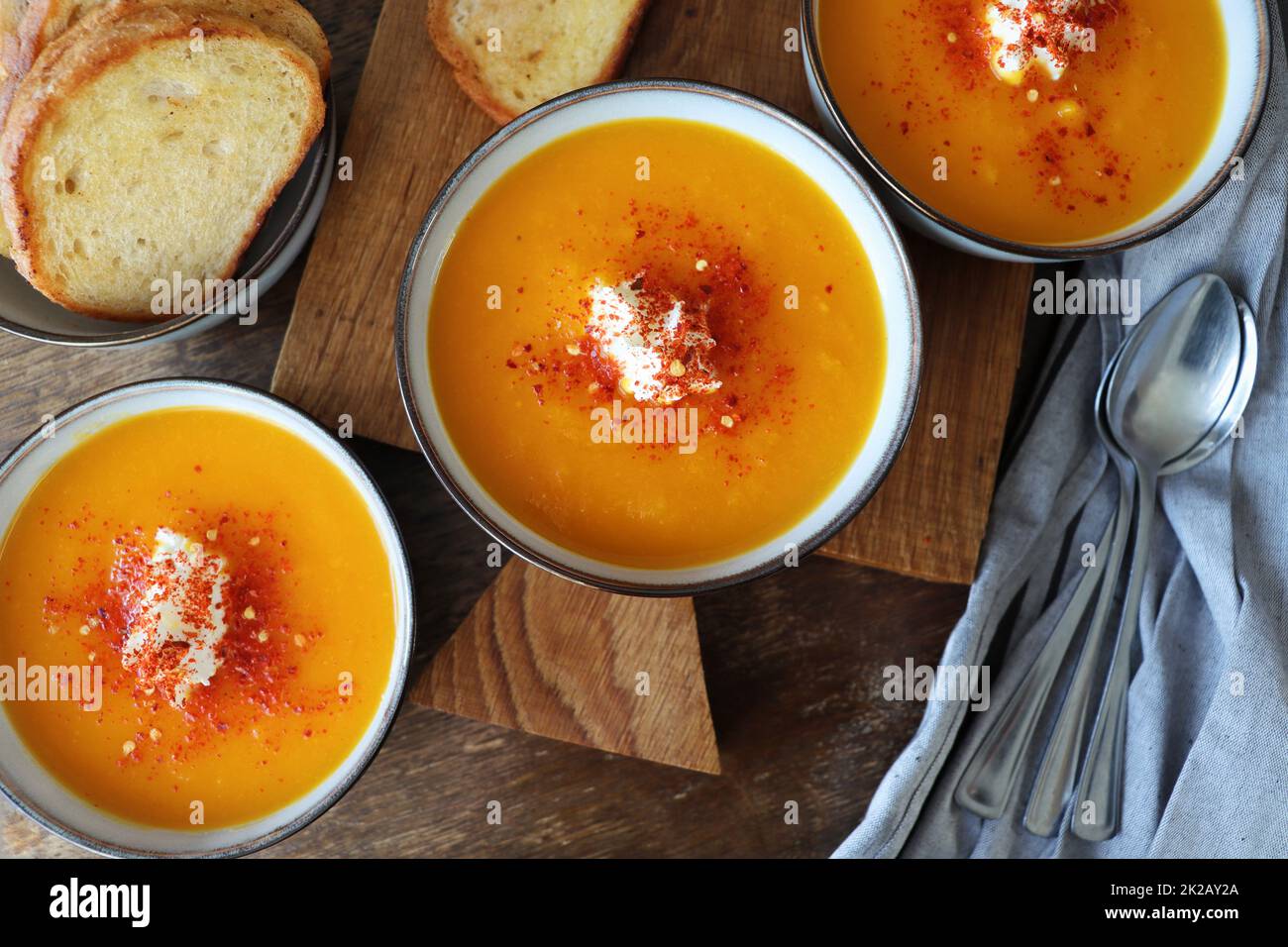 Thanksgiving concept with pumpkin soup .Fall table setting for ...