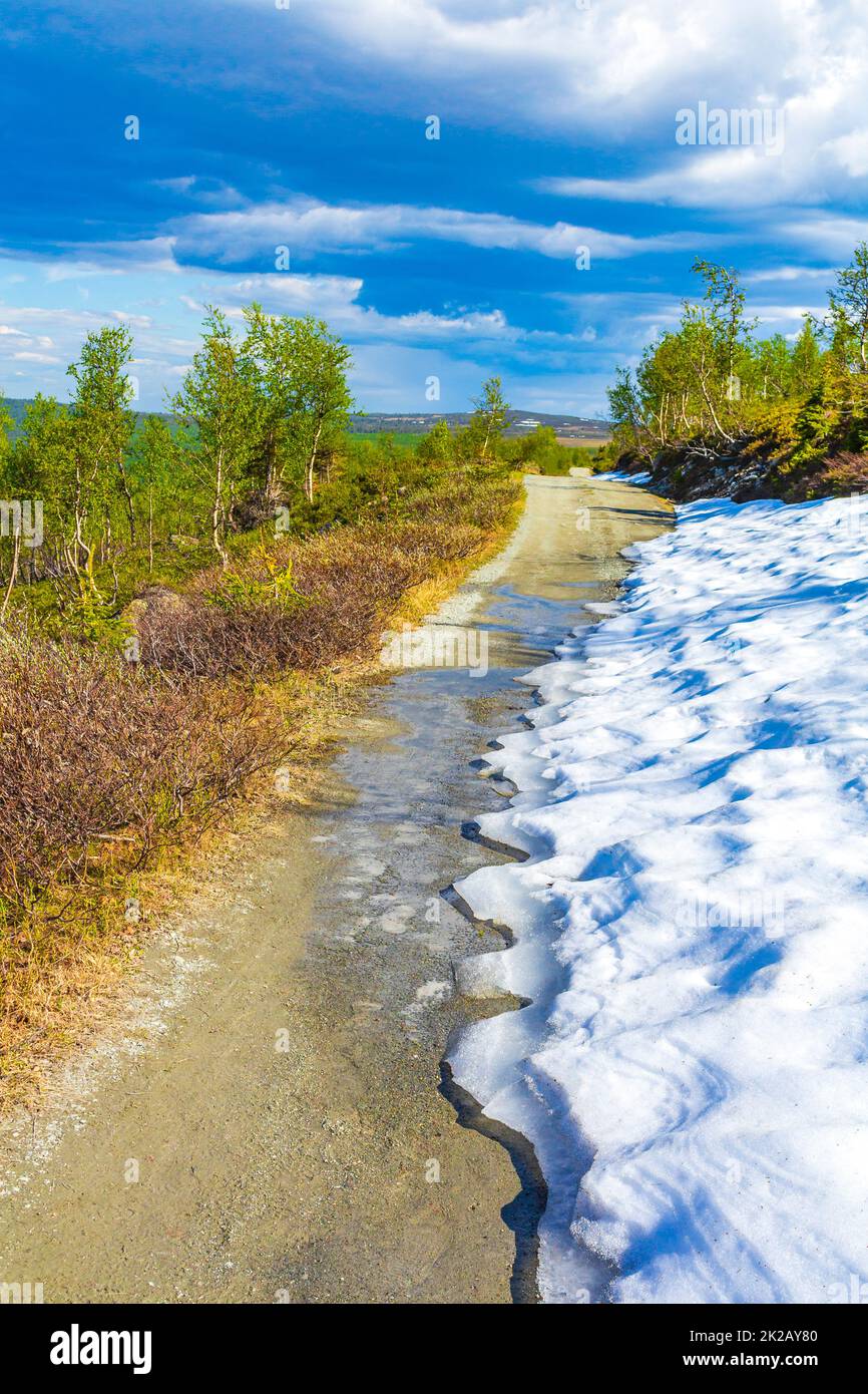 Melting snow on the road street on mountain Hemsedal Norway Stock Photo ...
