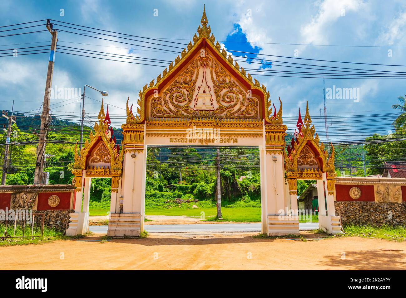 Colorful architecture of entrance gate Wat Ratchathammaram temple ...