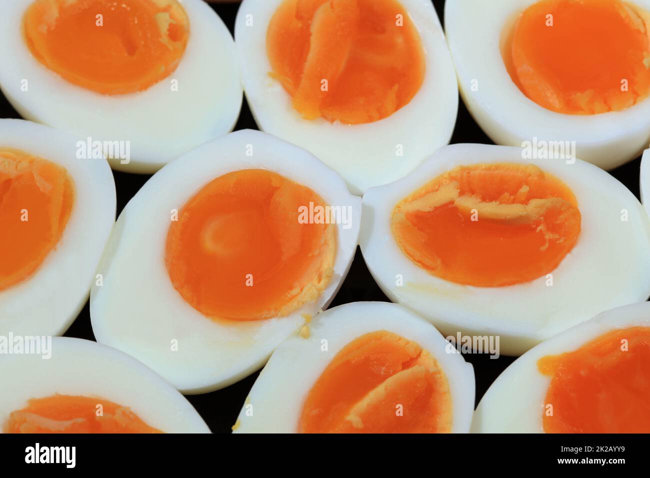 Halfs of hard boiled free-range eggs Stock Photo - Alamy
