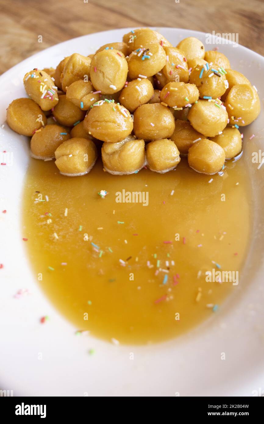 pignolata typical Sicilian and Calabrian dessert Stock Photo - Alamy