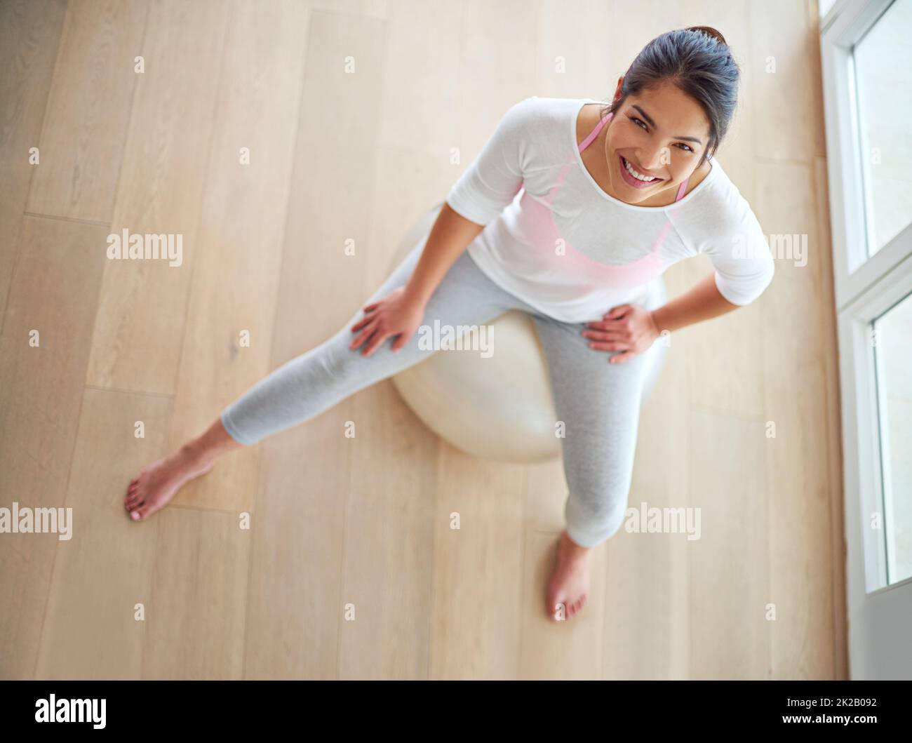 Are you ready to break a sweat. High angle shot of a young woman ...