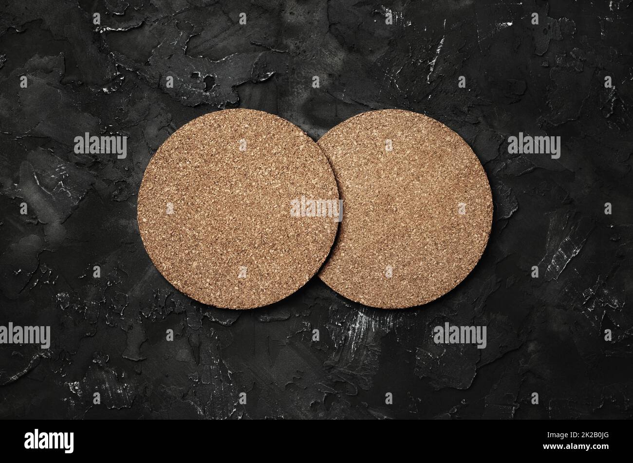 Two cork beer coasters Stock Photo - Alamy